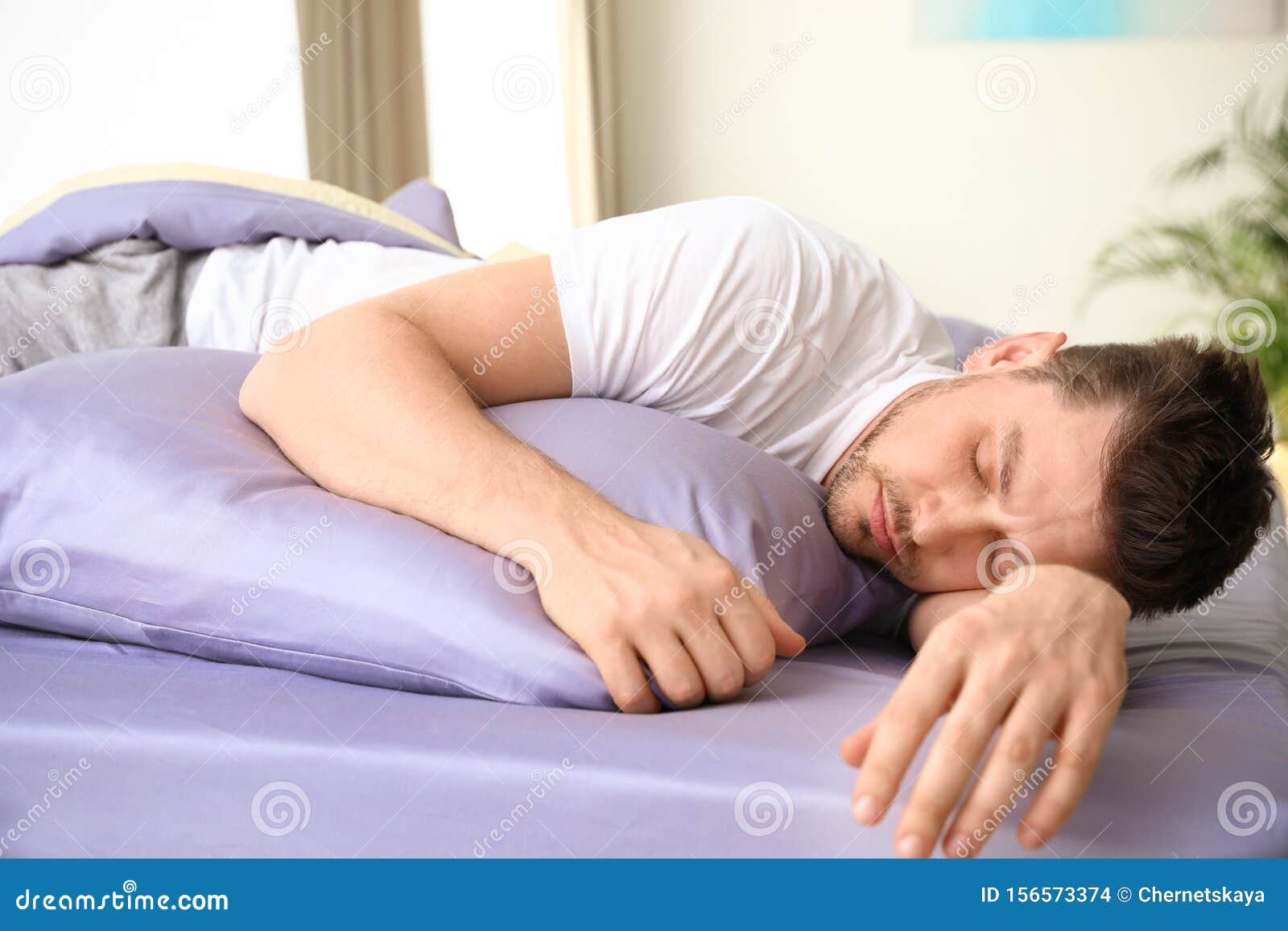 Handsome Man Sleeping on Pillow at Home Stock Photo - Image of male ...