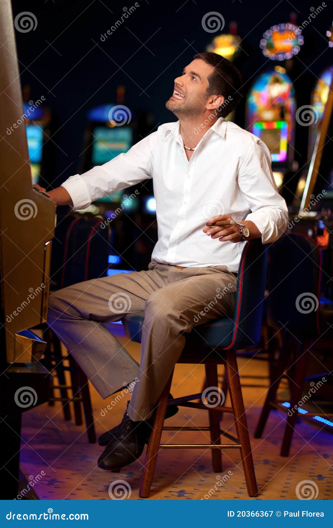 Handsome Man at the Slot Machine Stock Image - Image of betting, look ...