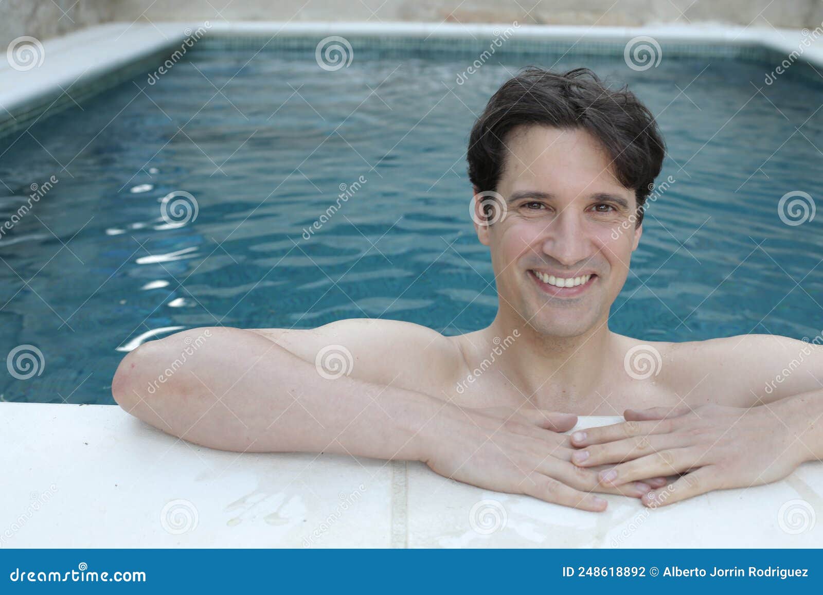 Handsome Man Smiling in a Swimming Pool Stock Photo - Image of person ...