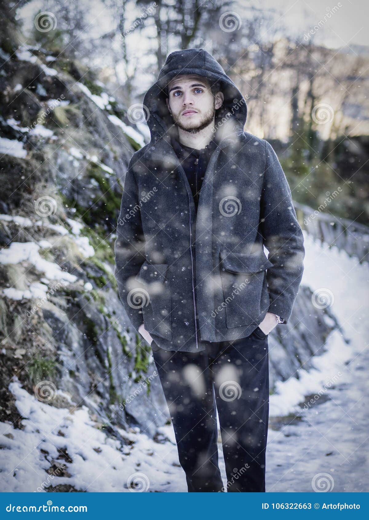 Handsome Man in Snowfall Posing for Camera Stock Image - Image of ...