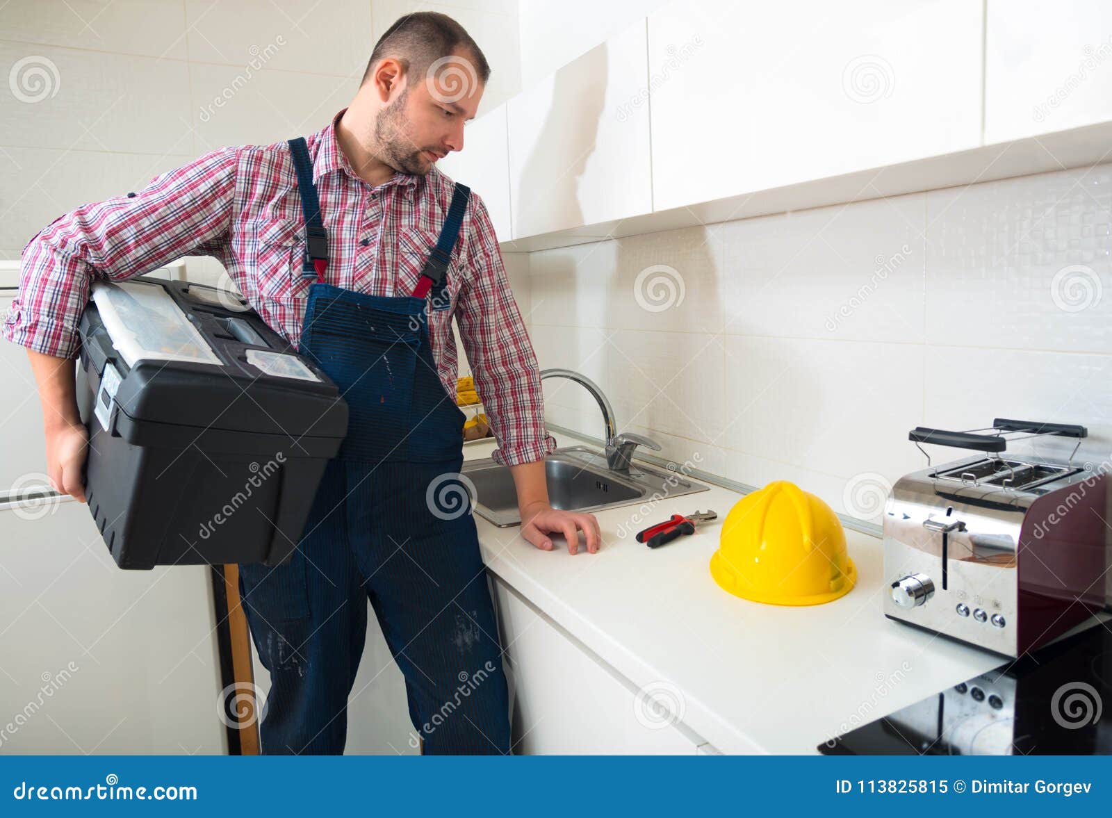Handsome Handyman Standing in the Kitchen with His Toolbox Stock Image ...