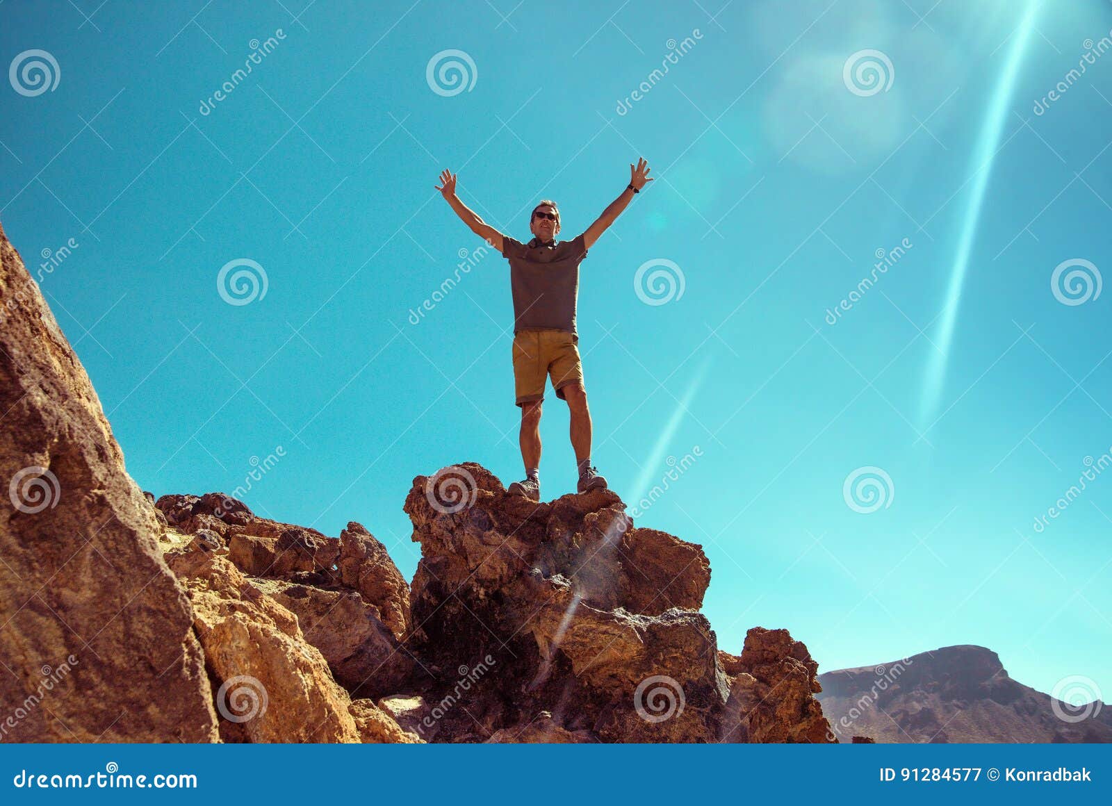 Handsome Man Standing on the Rock Stock Image - Image of body, energy ...