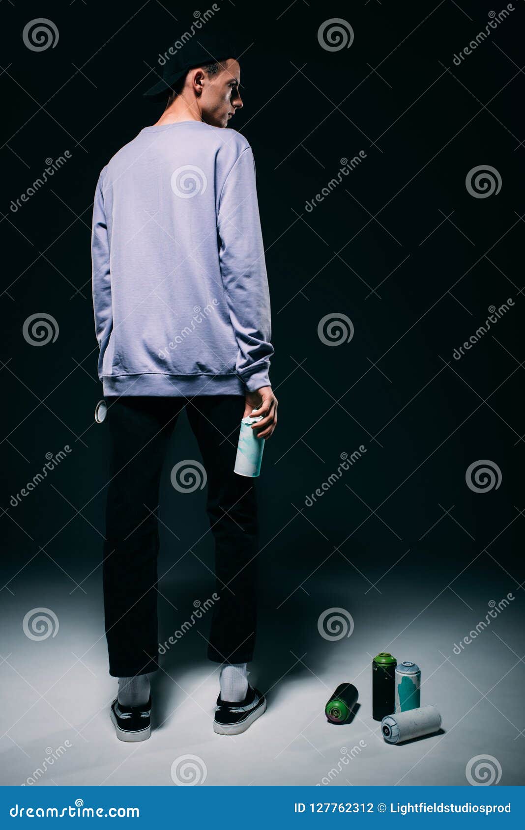 Handsome Man Standing with Spray Paint Stock Photo - Image of cans ...