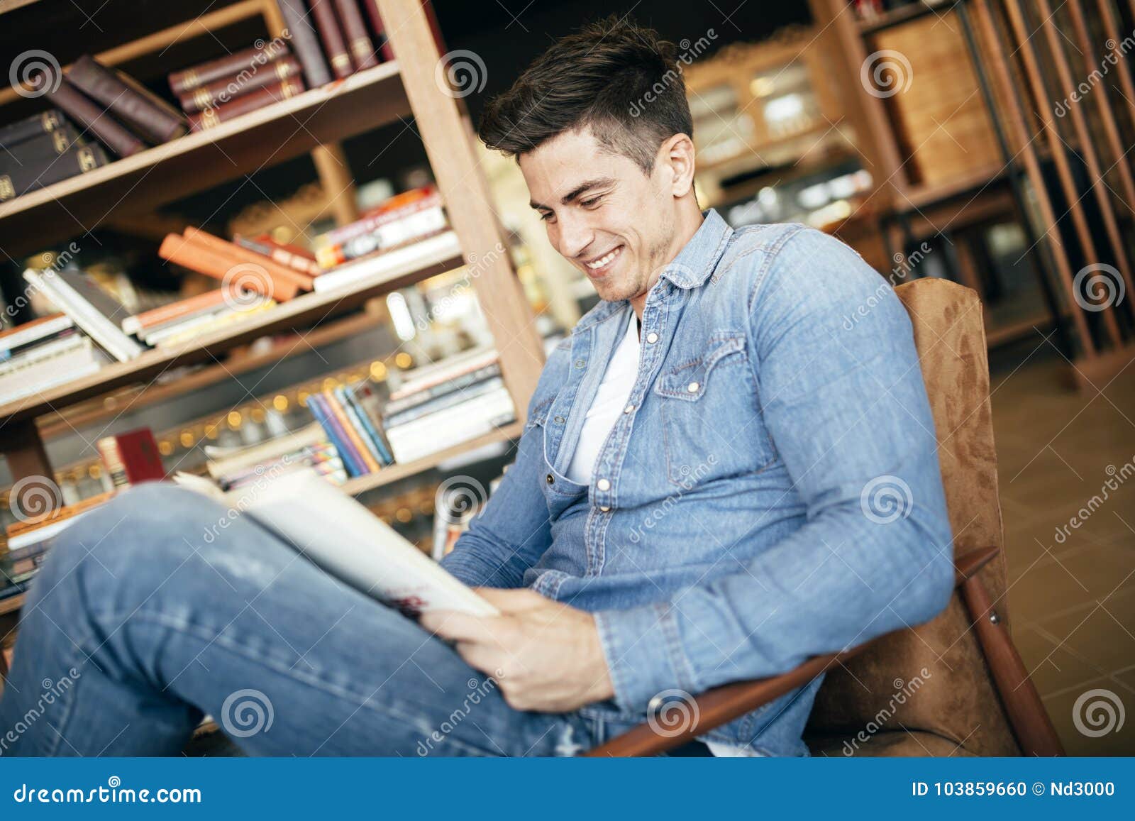 Handsome man studying stock photo. Image of cheerful - 103859660