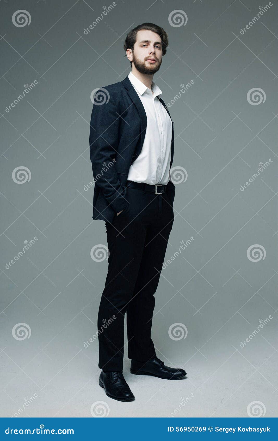 Handsome man in suit stock image. Image of cool, chair - 56950269