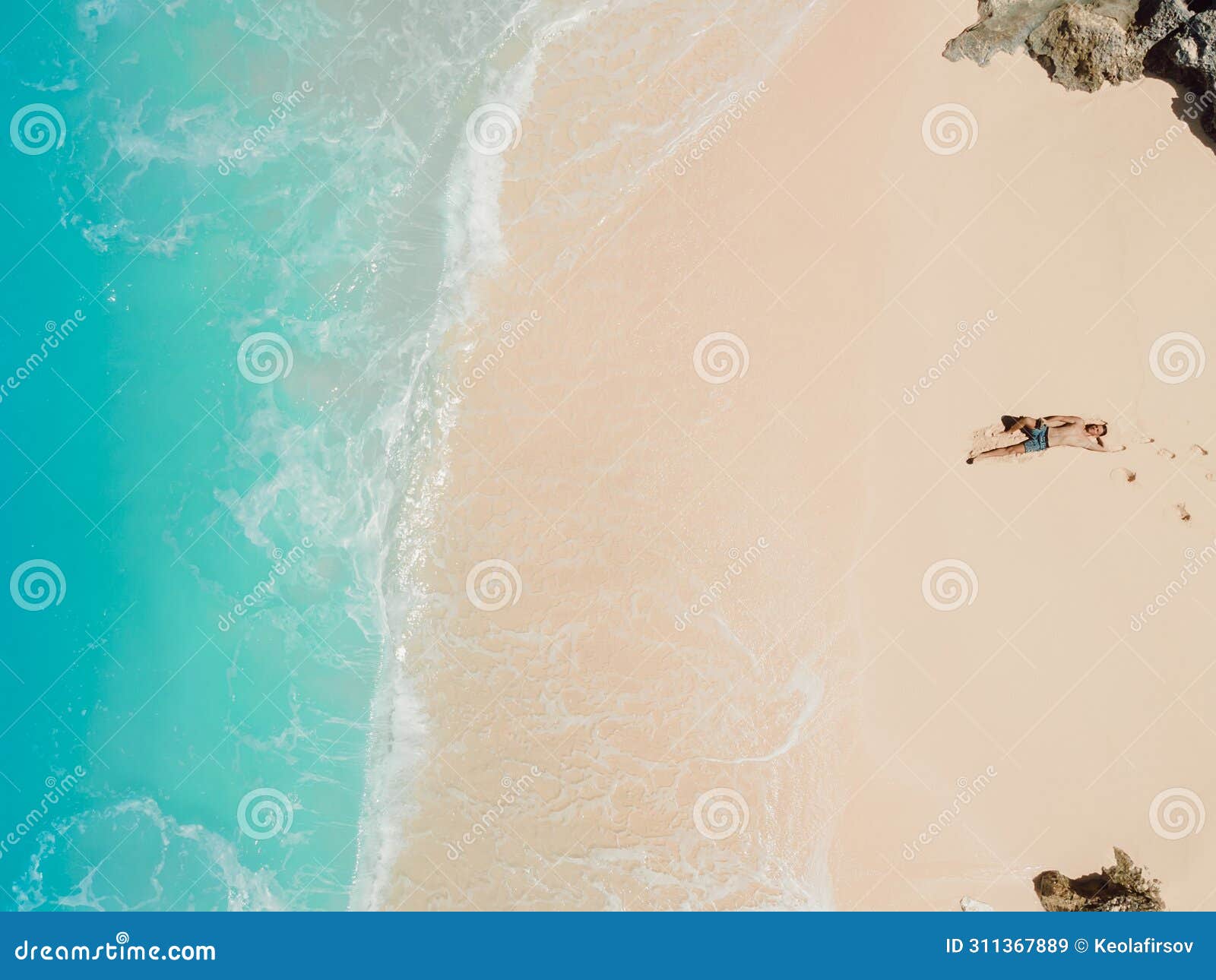Man Sunbathing at Tropical Ocean Beach. Aerial View Stock Image - Image ...