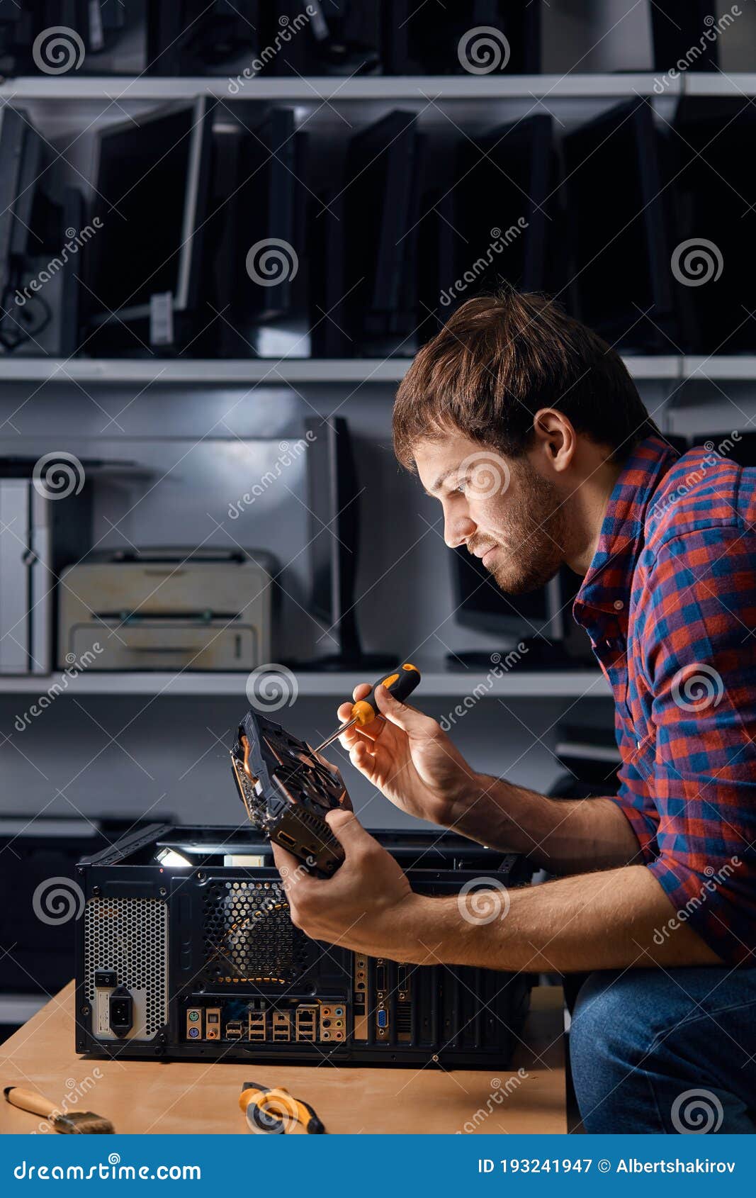 Handsome Man Taking the Old Computer Equipmnet Apart Stock Image ...