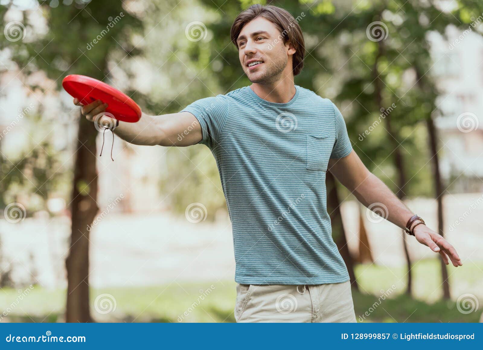 Handsome Man Throwing Frisbee Disk Stock Image - Image of summer ...