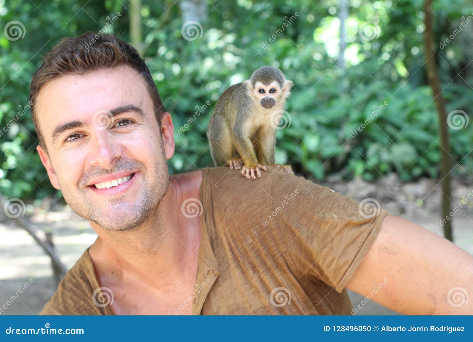 Handsome Man with Titi Monkey on His Shoulder Stock Photo - Image of ...