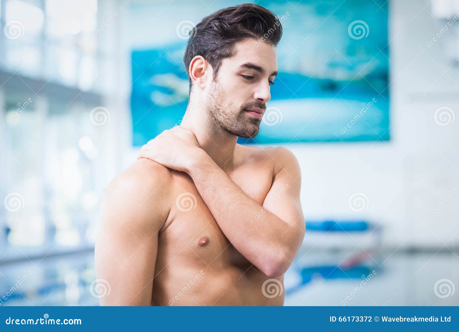 Handsome Man Touching His Shoulder Stock Photo - Image of adult ...