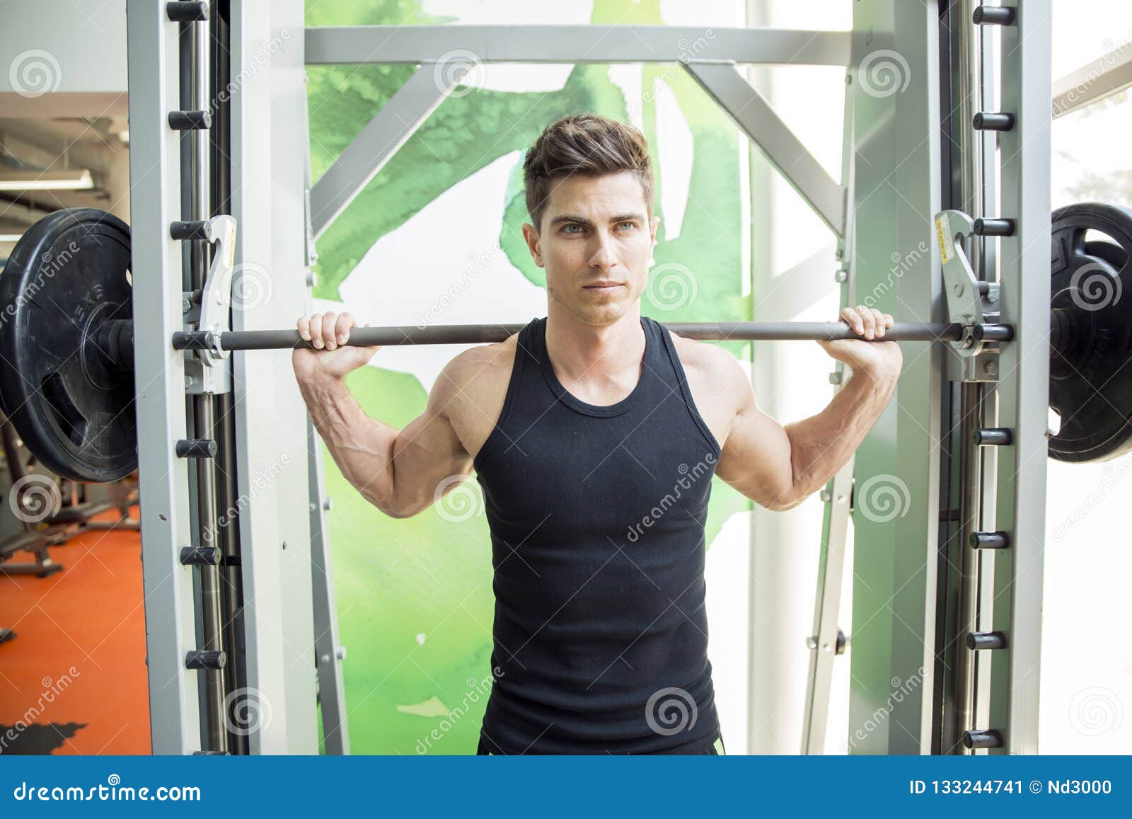 Handsome Man Training in Gym Stock Image - Image of barbell, people ...