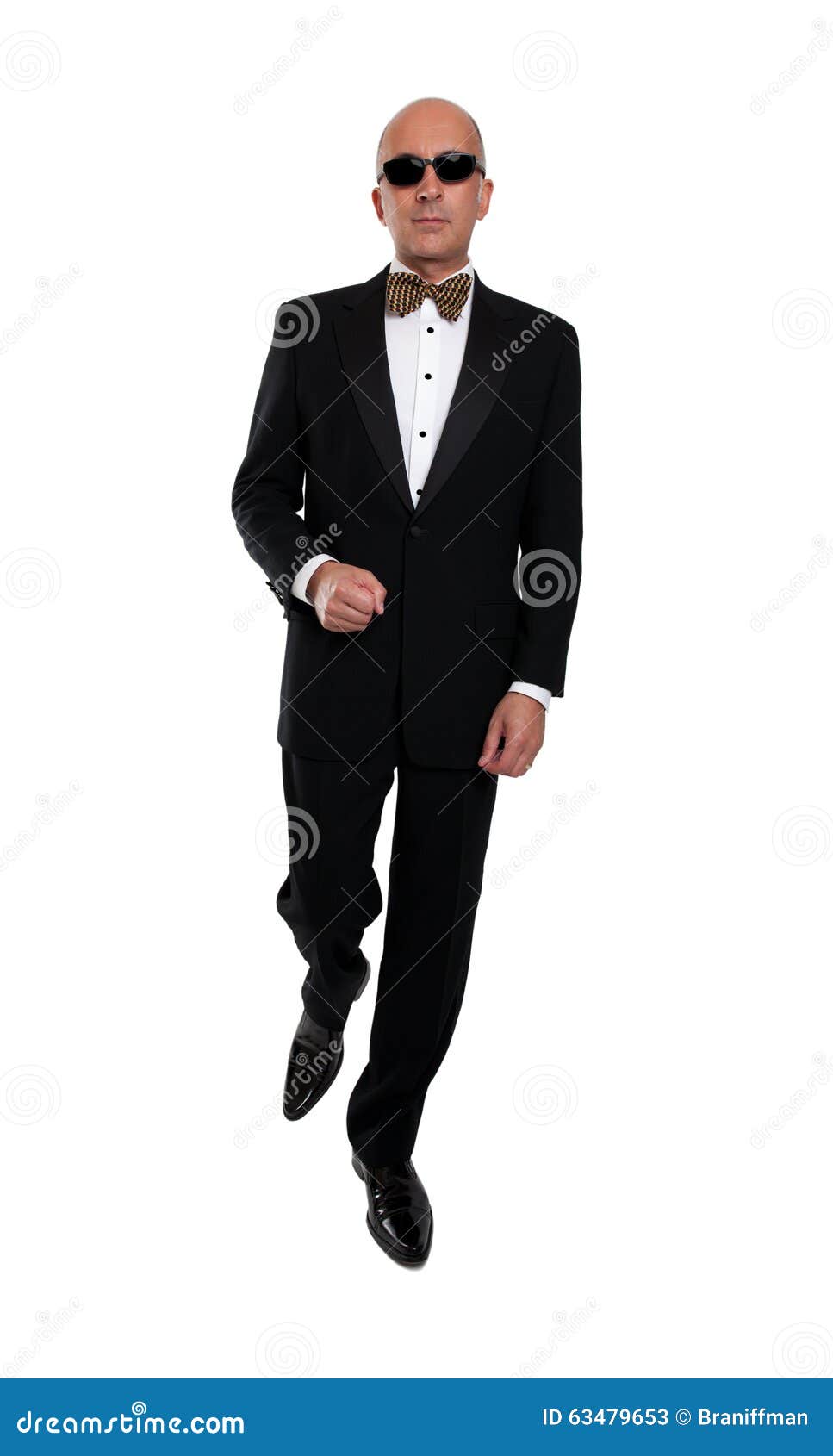Handsome man in a tuxedo stock image. Image of looking - 63479653