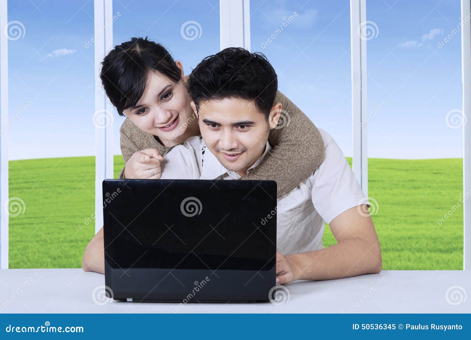 Handsome Man Using Laptop with Girlfriend Stock Image - Image of ...