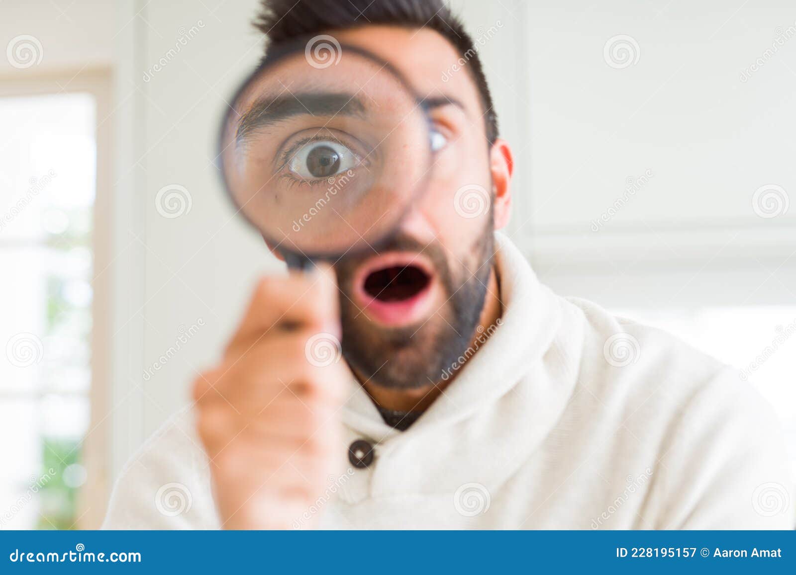 Handsome Man Using Magnifying Glass, Doing Funny Faces Stock Image ...