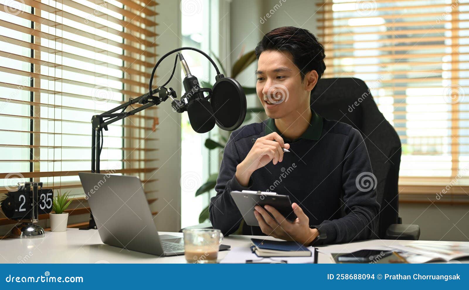 Handsome Man Using Microphone while Streaming Audio Podcast at Home ...