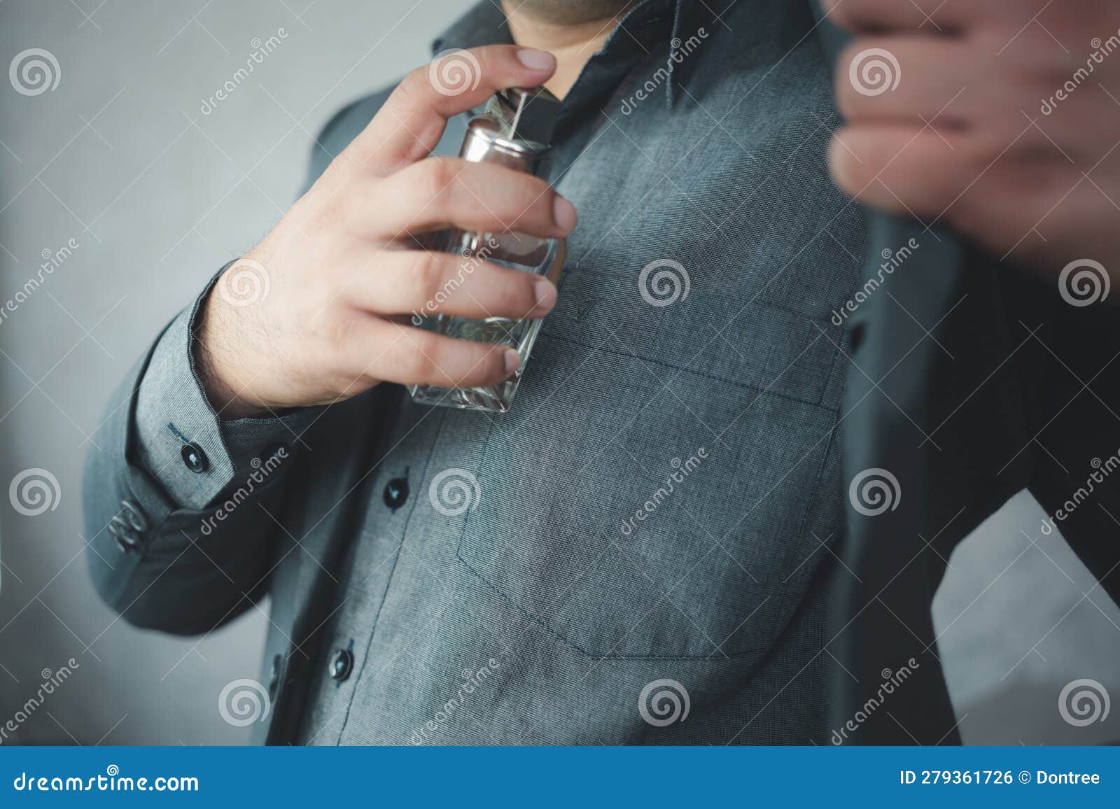 Handsome Man Using Perfume at Home Stock Photo - Image of advertisement ...
