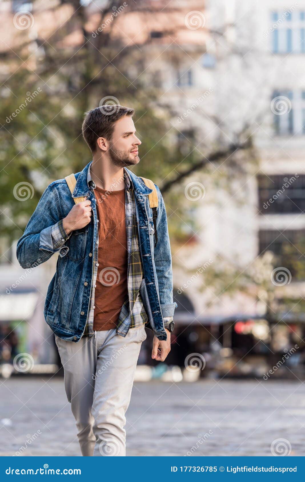 Man Walking with Backpack and Looking Stock Image - Image of backpack ...