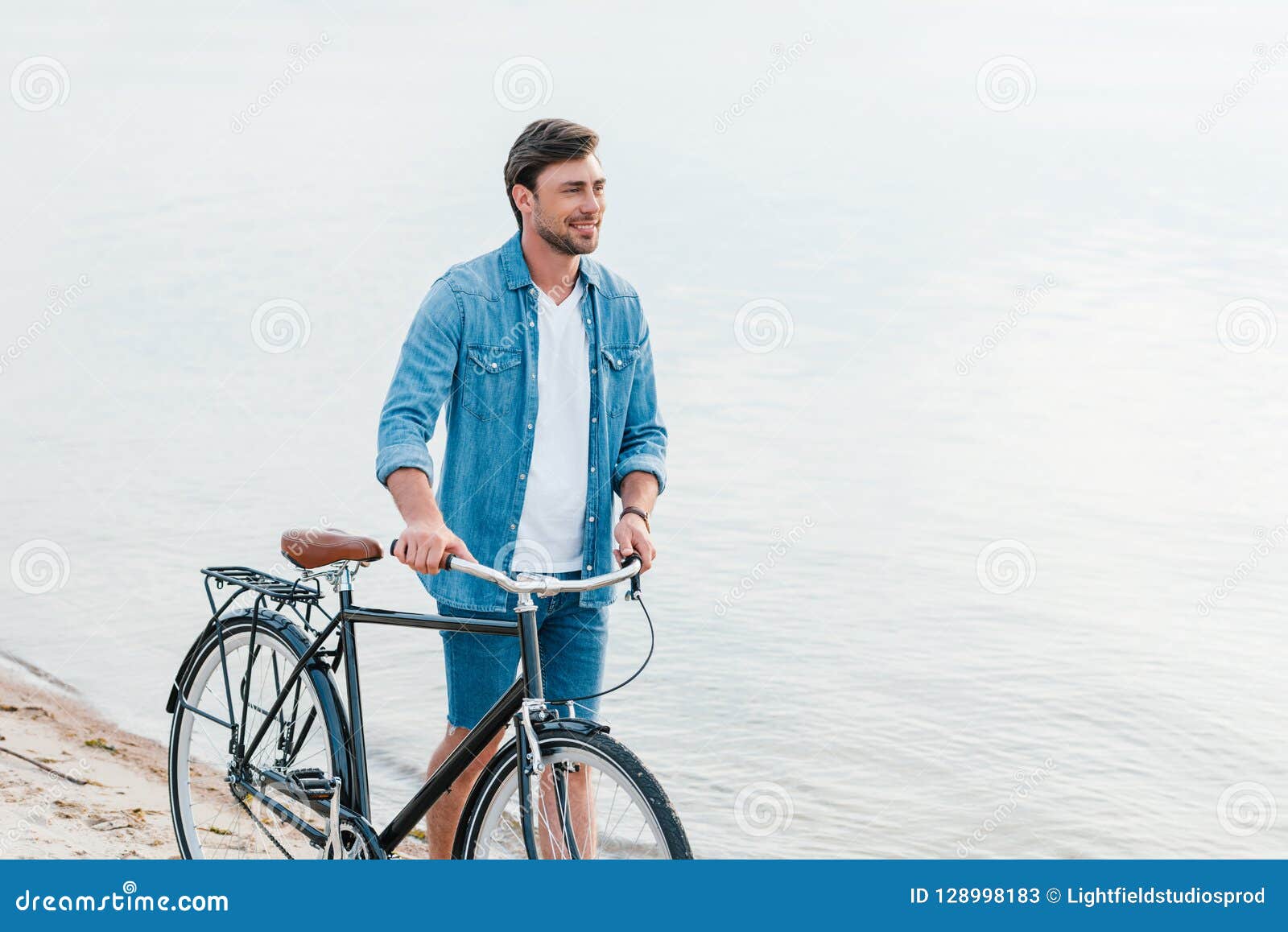 Handsome Man Walking with Bike Stock Image - Image of walk, male: 128998183