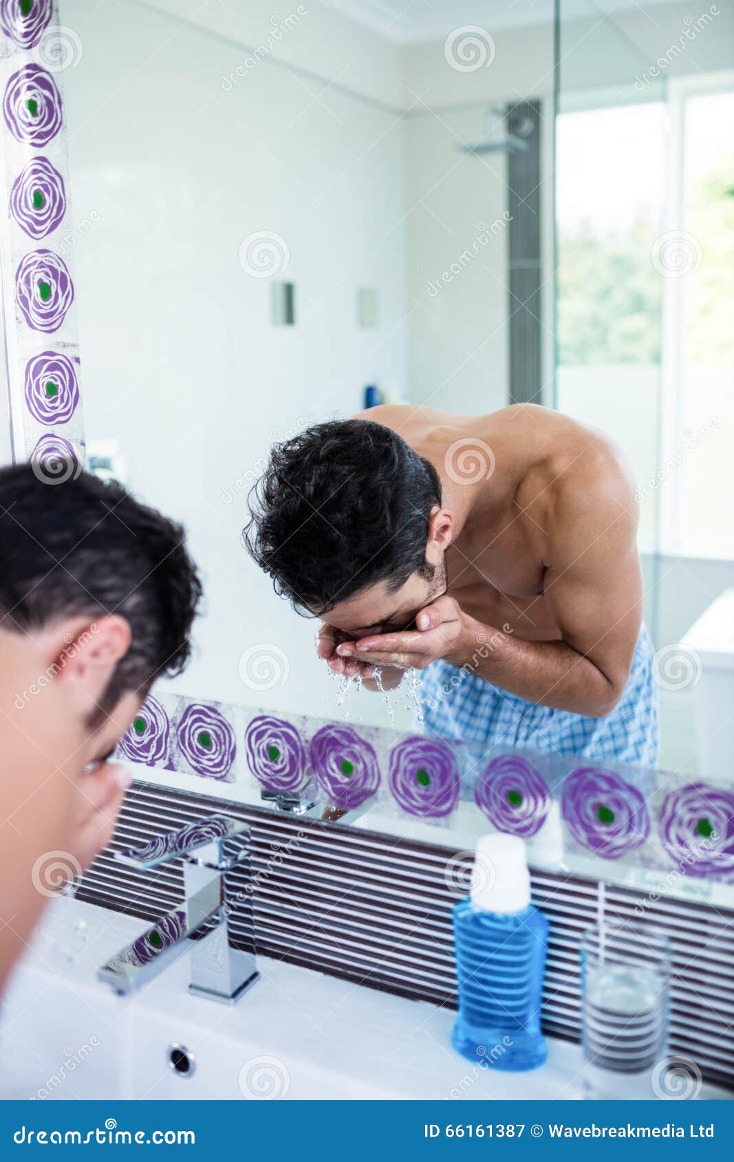 Handsome Man Washing His Face Stock Image - Image of male, person: 66161387