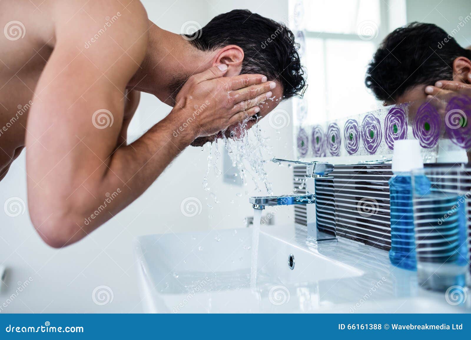 Handsome Man Washing His Face Stock Photo - Image of brown, freshness ...