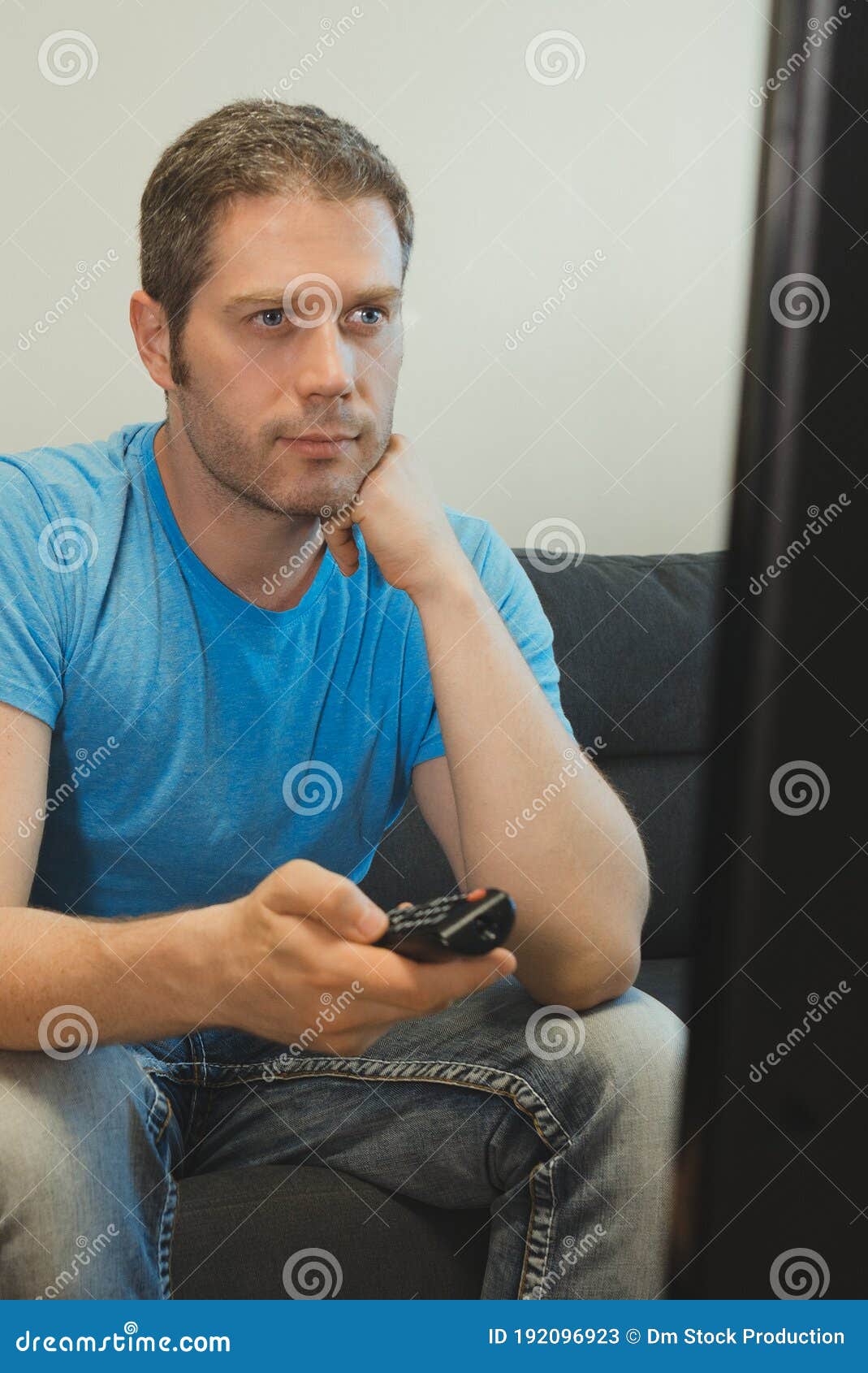 Man watching TV stock image. Image of display, flatscreen - 192096923