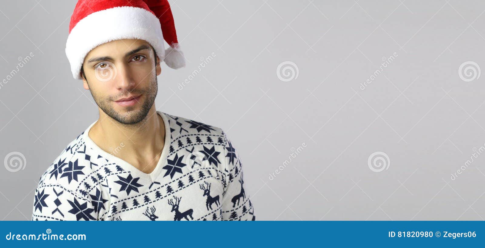 Handsome Man Wearing a Santa Hat Stock Photo - Image of face, young ...