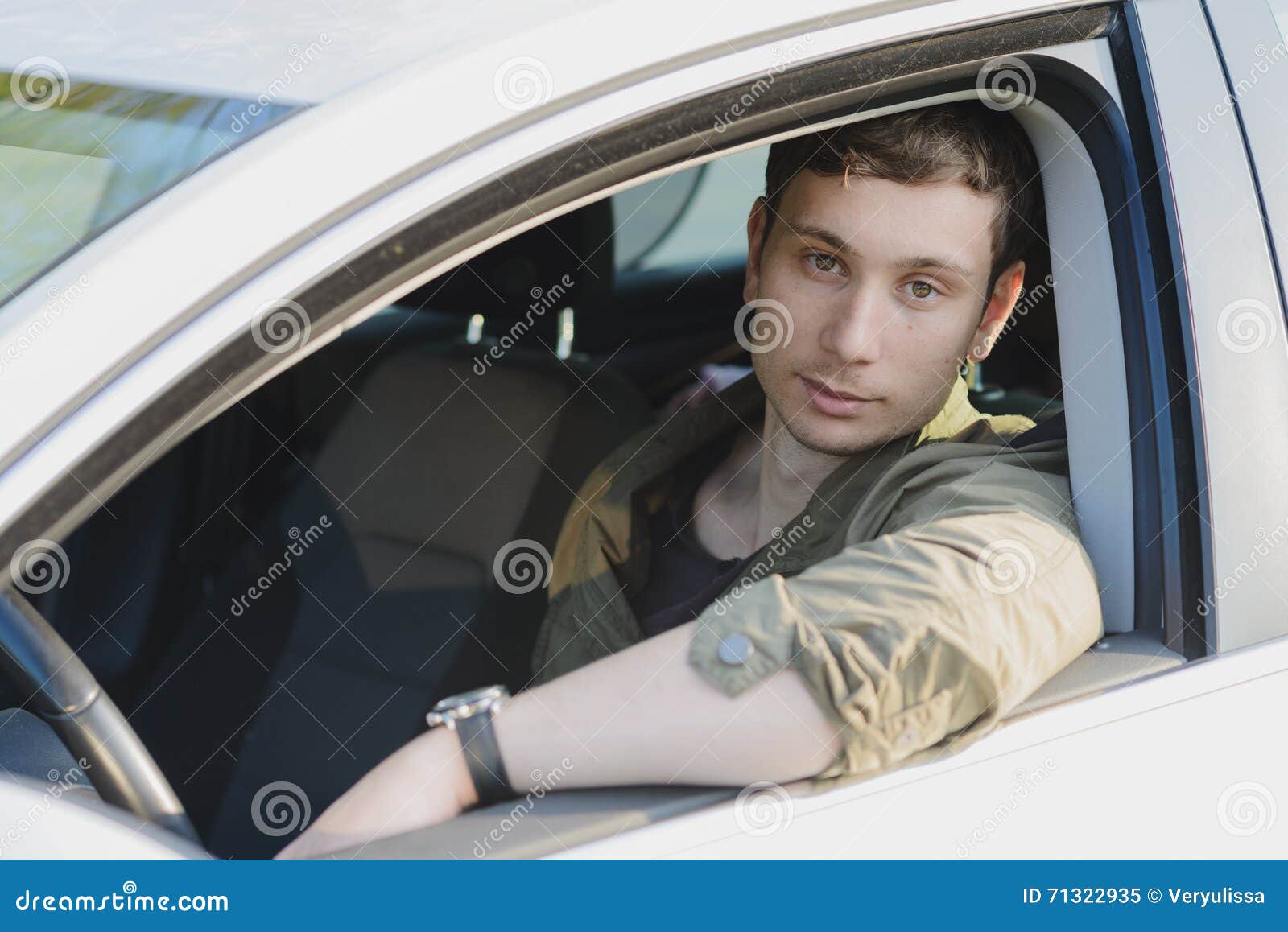 Handsome man in white car stock image. Image of driving - 71322935