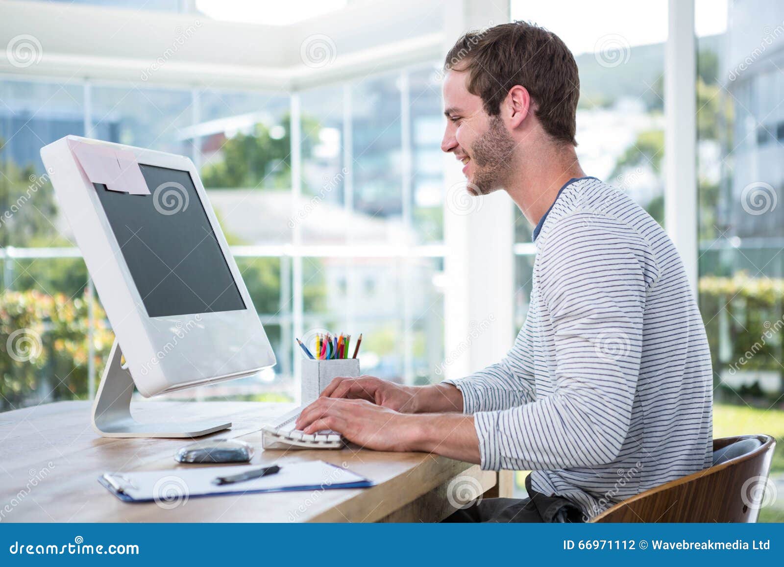 Handsome Man Working on Computer Stock Photo - Image of enjoying, cute ...