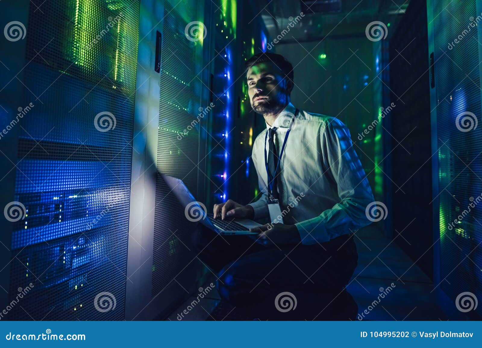 Man in data centre stock photo. Image of information - 104995202