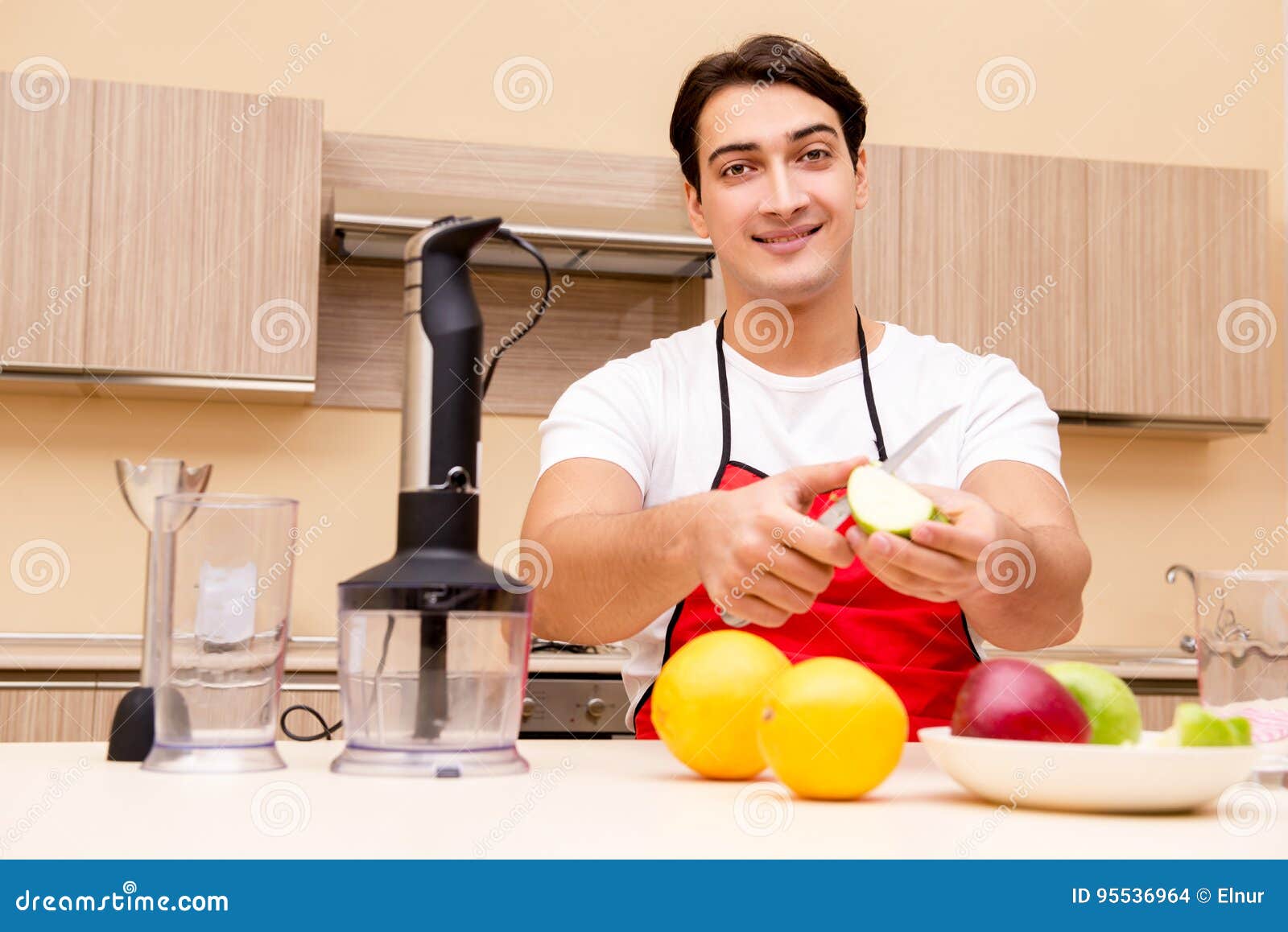 The Handsome Man Working at the Kitchen Stock Photo - Image of juice ...