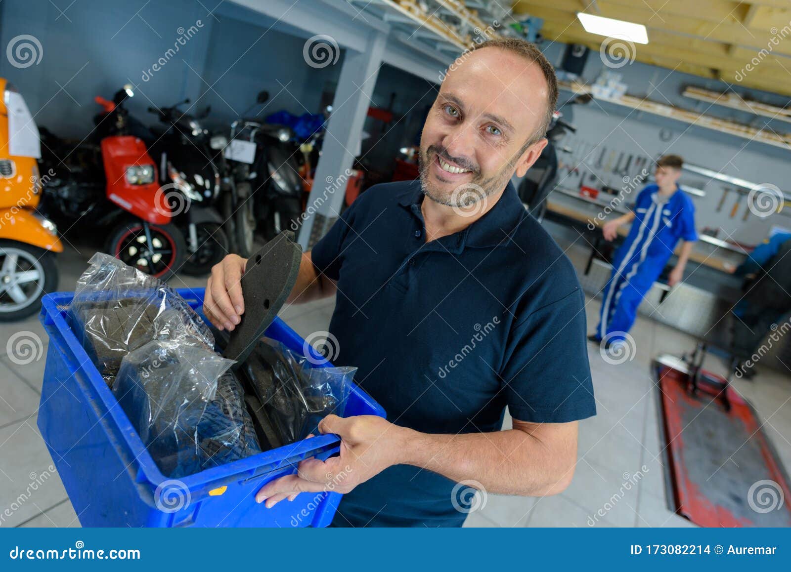 Handsome Man Working at Motorcycle Repair Shop Stock Photo - Image of ...