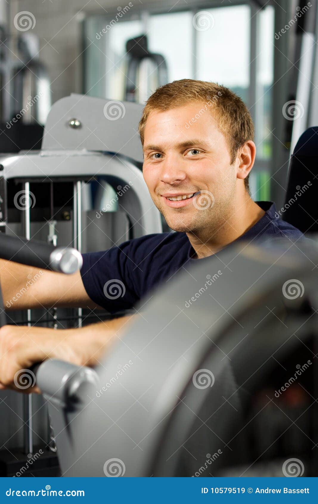 Handsome man working out stock image. Image of smiling - 10579519