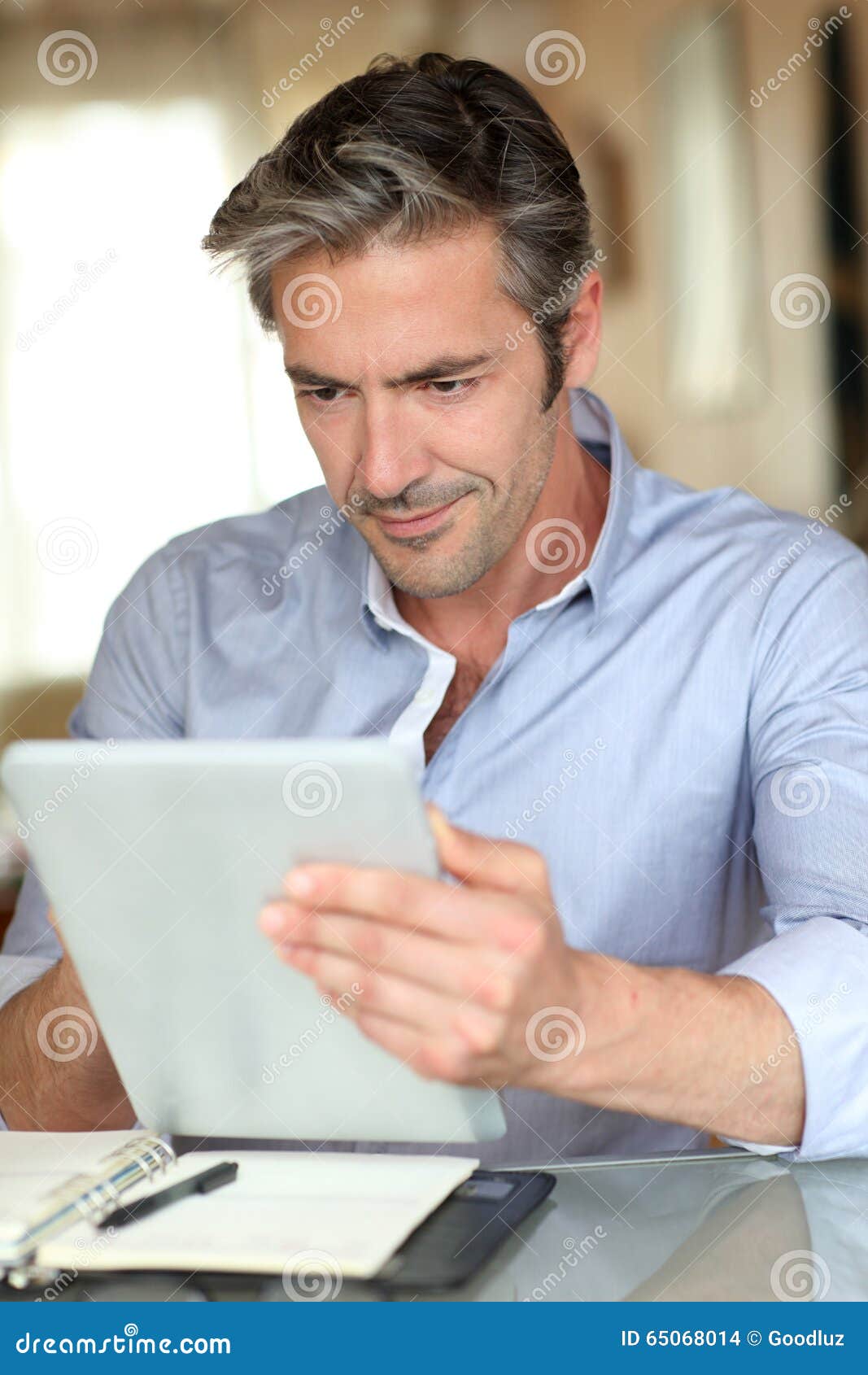 Handsome Man Working on Tablet Stock Photo - Image of computer ...