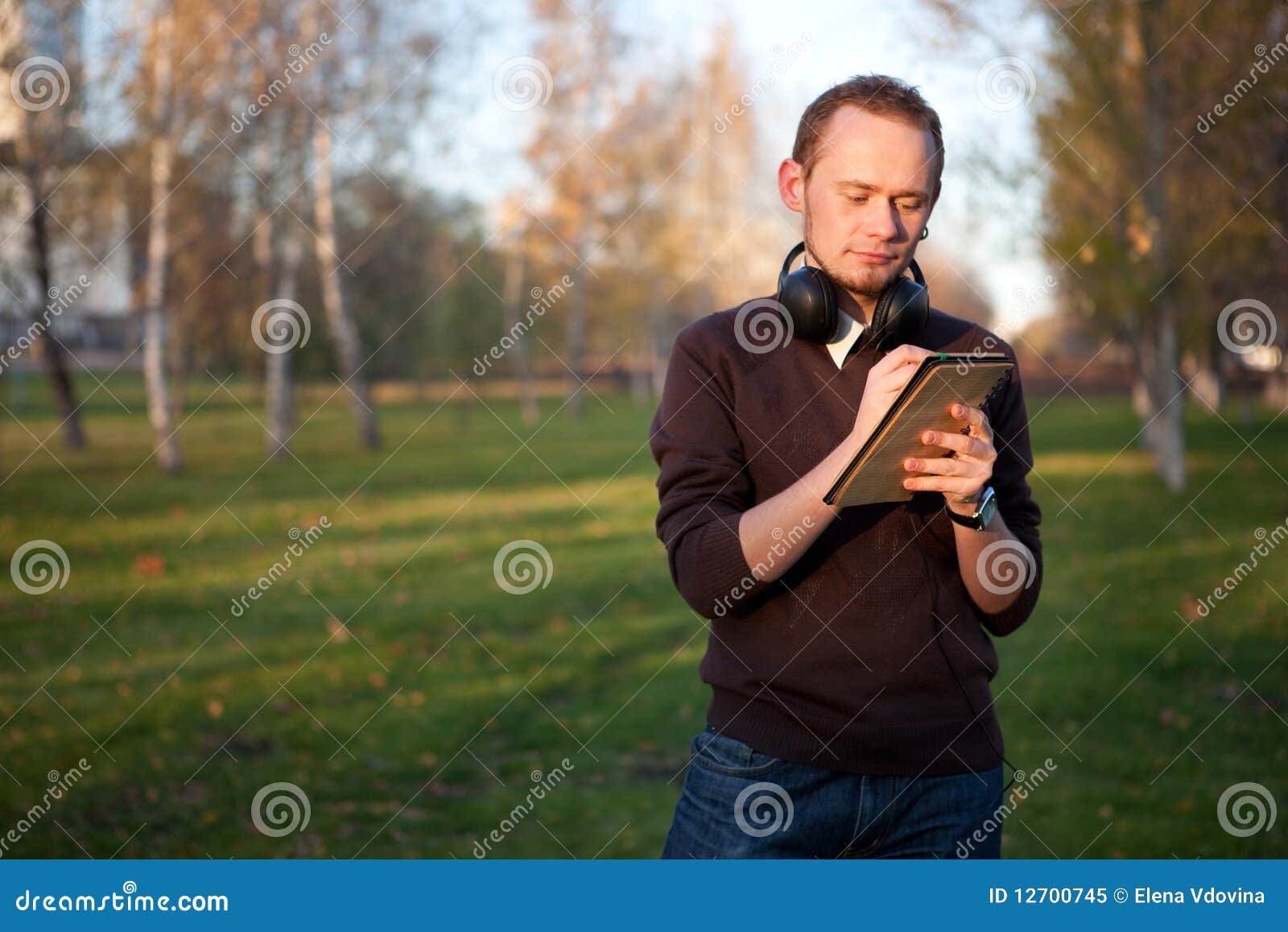 Handsome Man Writing in His Notebook Stock Image - Image of male ...