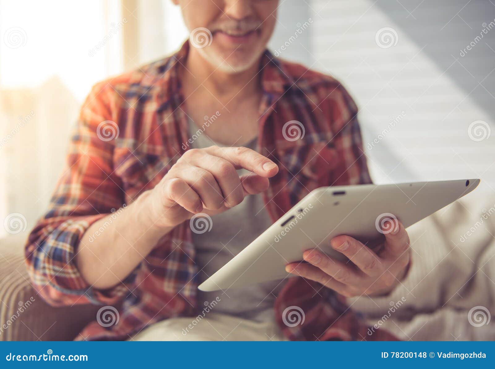 Handsome Mature Man with Gadget Stock Photo - Image of lifestyle, news ...