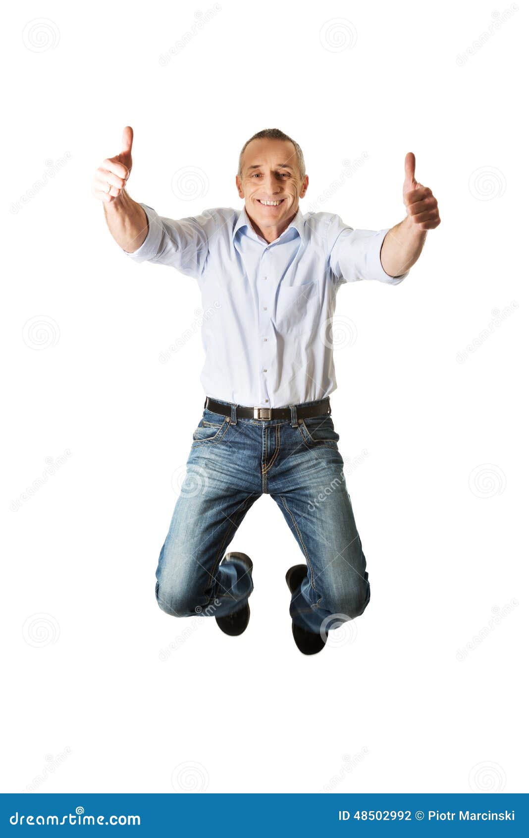Handsome Mature Man Jumping with Thumbs Up Stock Photo - Image of ...