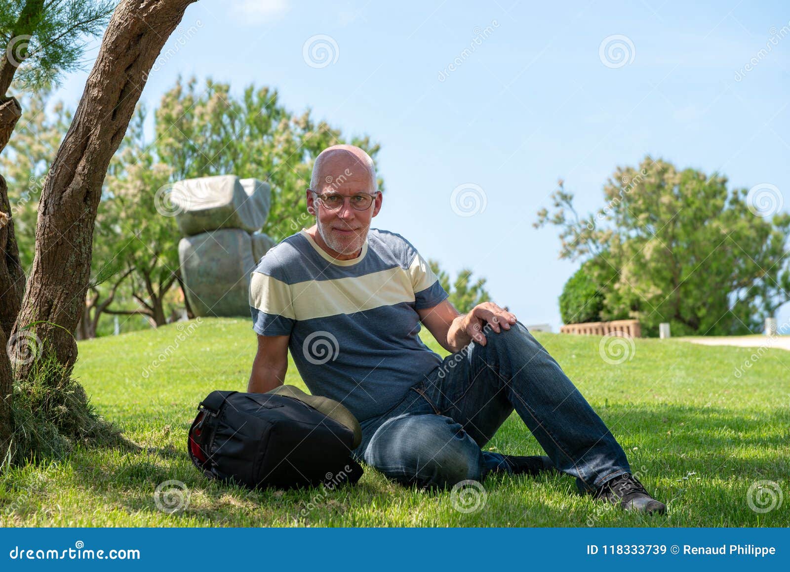 Handsome Mature Man is Resting Under a Tree Stock Image - Image of ...