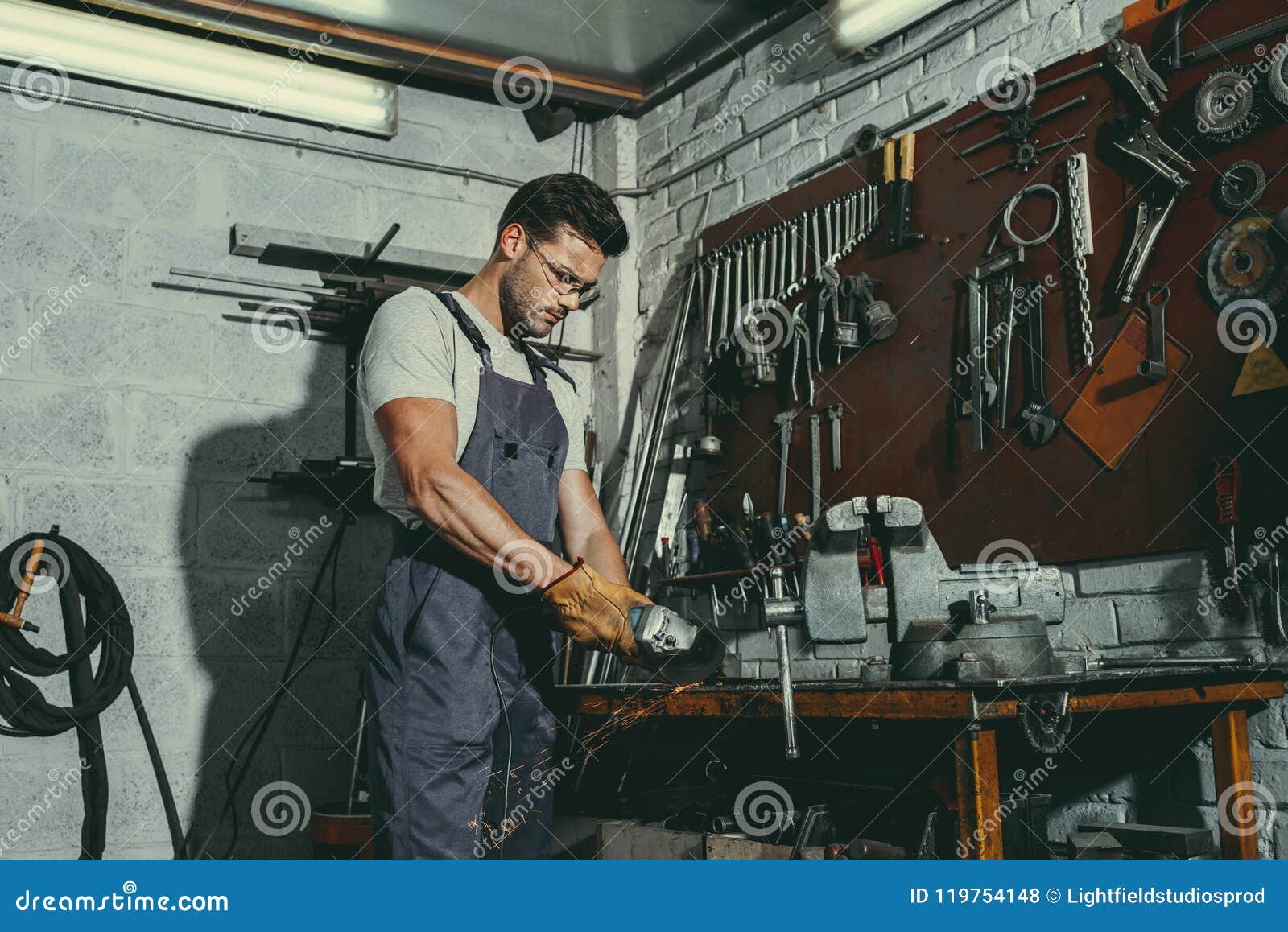 Handsome Mechanic with Tools Stock Photo - Image of handsome, working ...