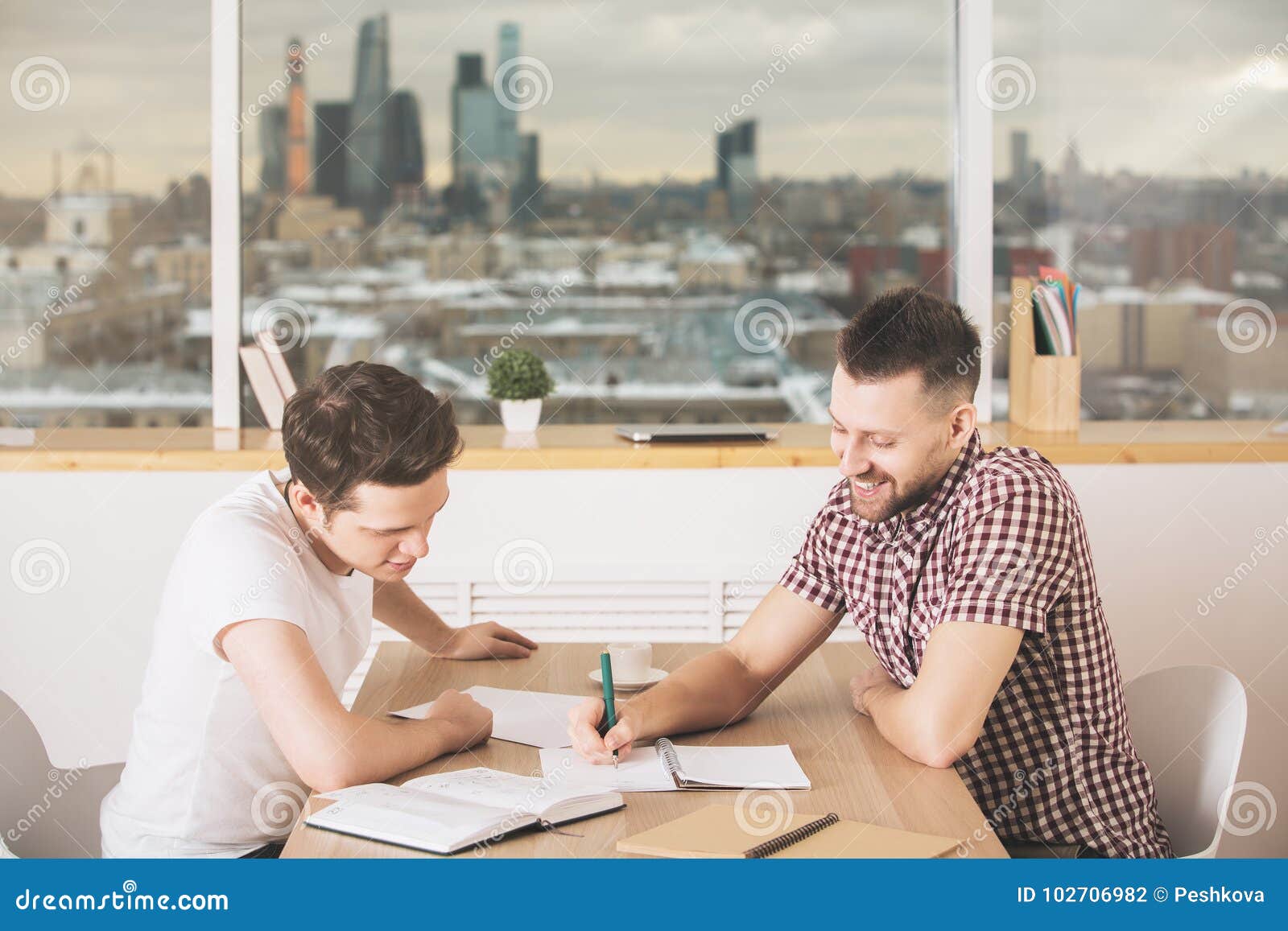 Handsome Men Doing Paperwork Side Stock Photo - Image of notepad ...