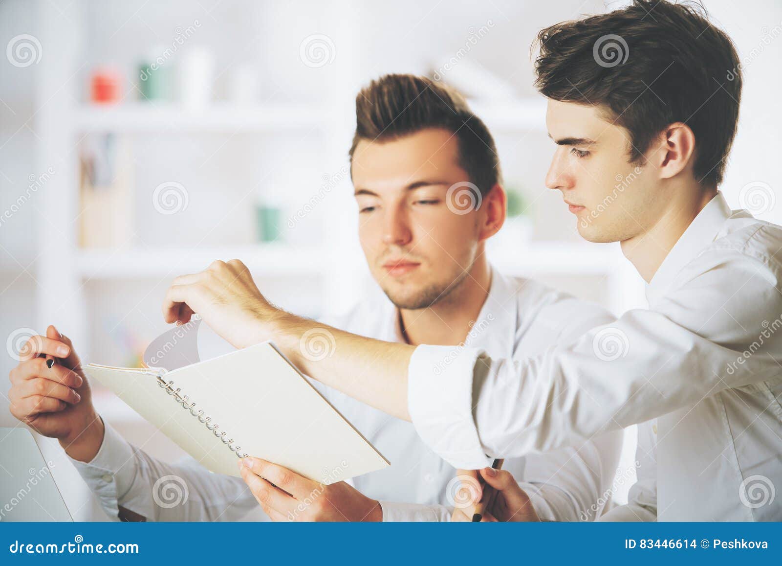 Handsome Men Doing Paperwork Stock Photo - Image of paper, boys: 83446614