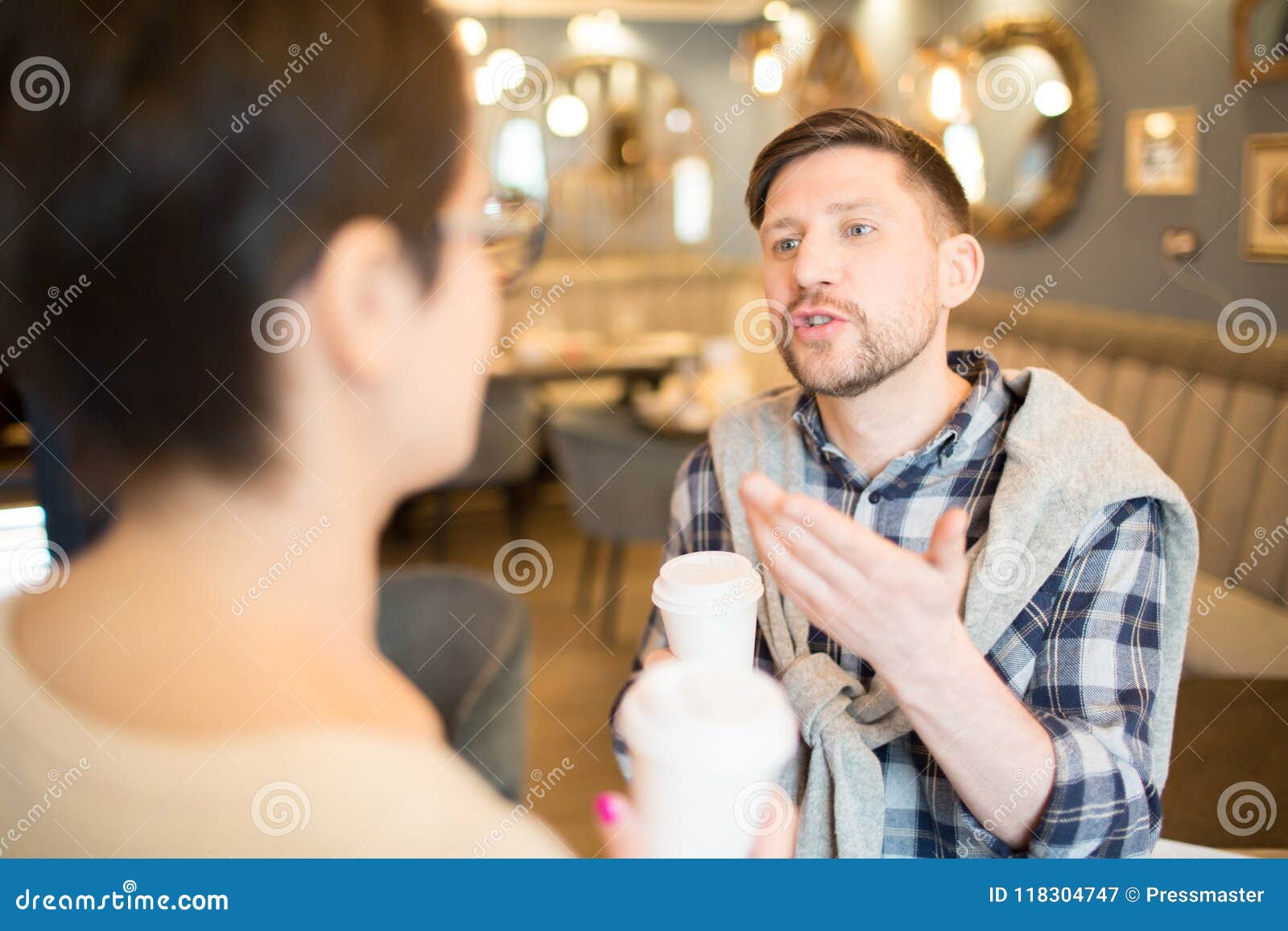 Emotional Man Speaking To Colleague In Cafe Stock Image Image Of
