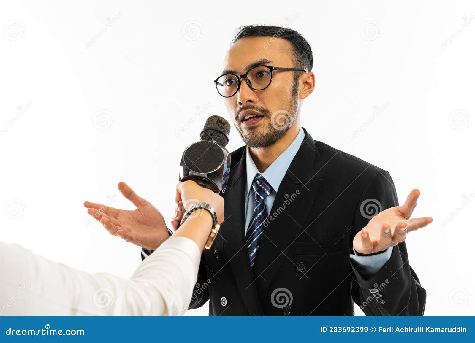 A Handsome Men Interviewed by a Journalist Stock Image - Image of ...