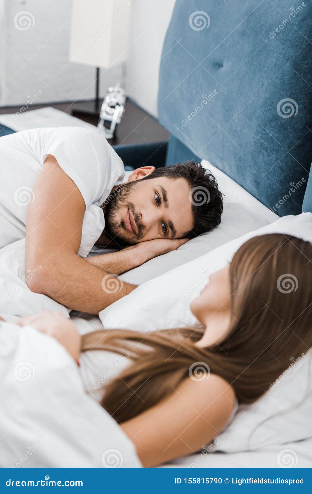 Handsome Man Lying in Bed and Looking Stock Photo - Image of boyfriend ...