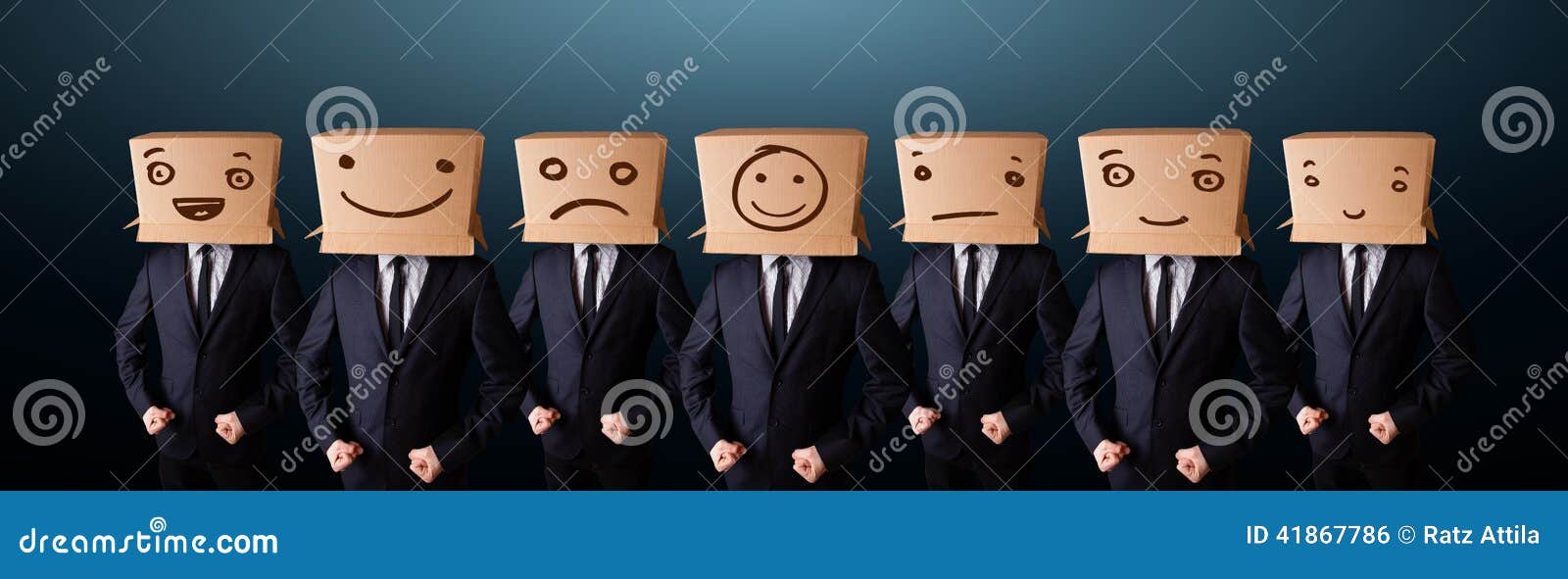 Handsome Men in Suit Gesturing with Drawn Smiley Faces on Box Stock ...