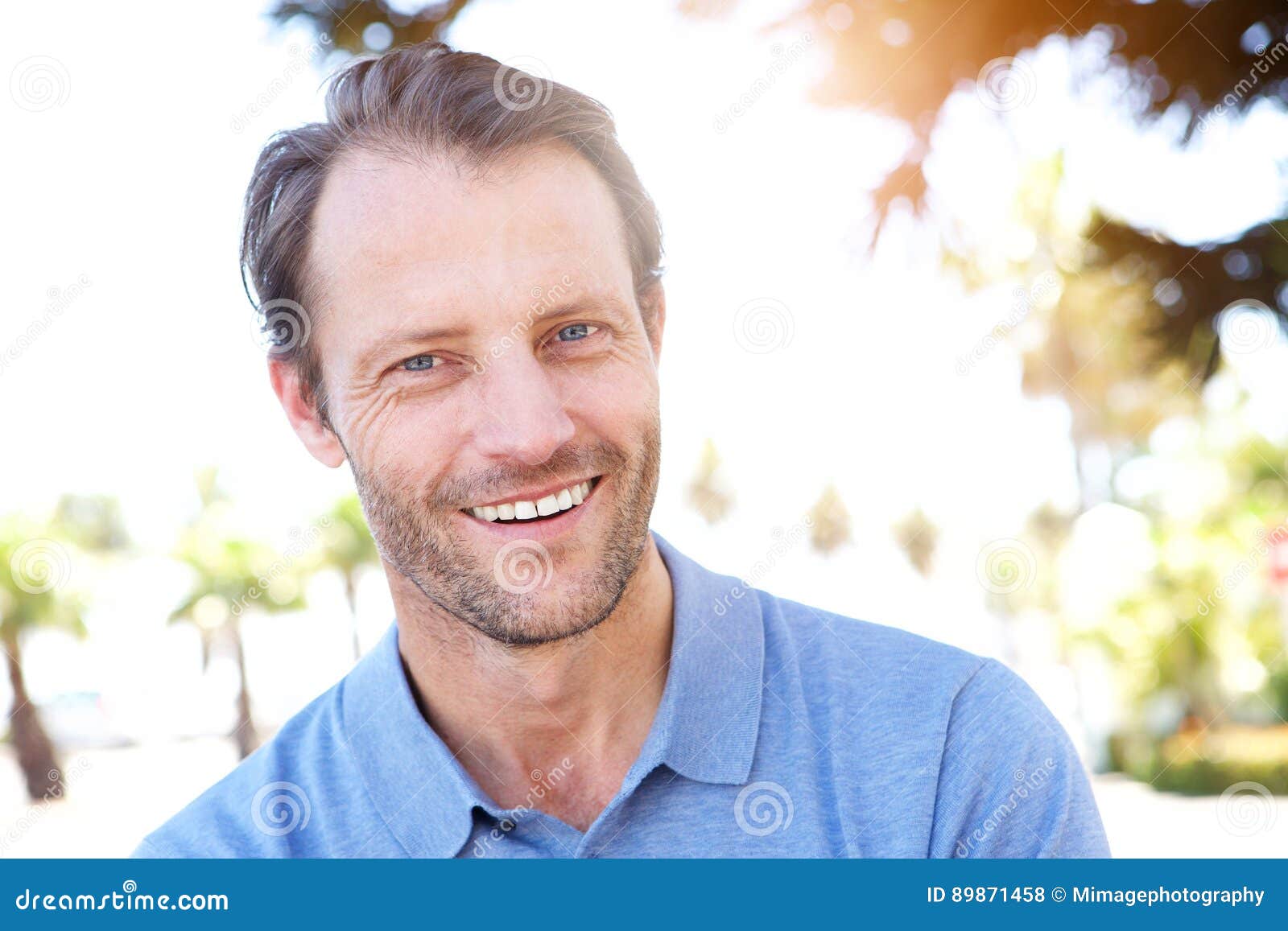 Handsome Middle Age Man Smiling Outdoors Stock Photo - Image of ...