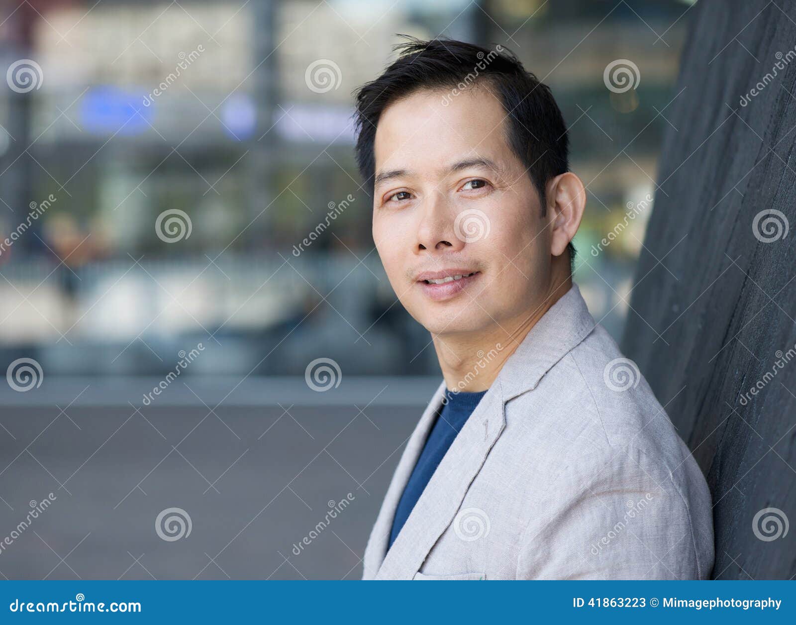 Handsome Middle Aged Asian Man Stock Image - Image of leaning, adult ...