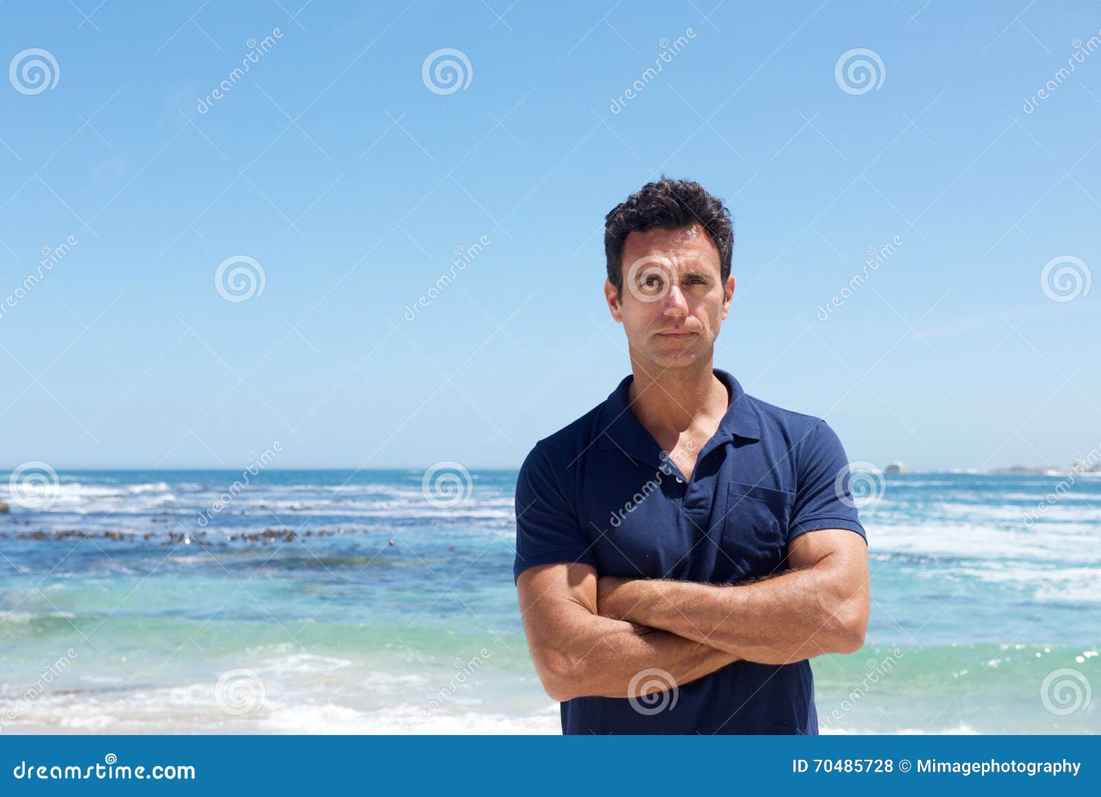 Handsome Middle Aged Man with Serious Expression at the Beach Stock ...