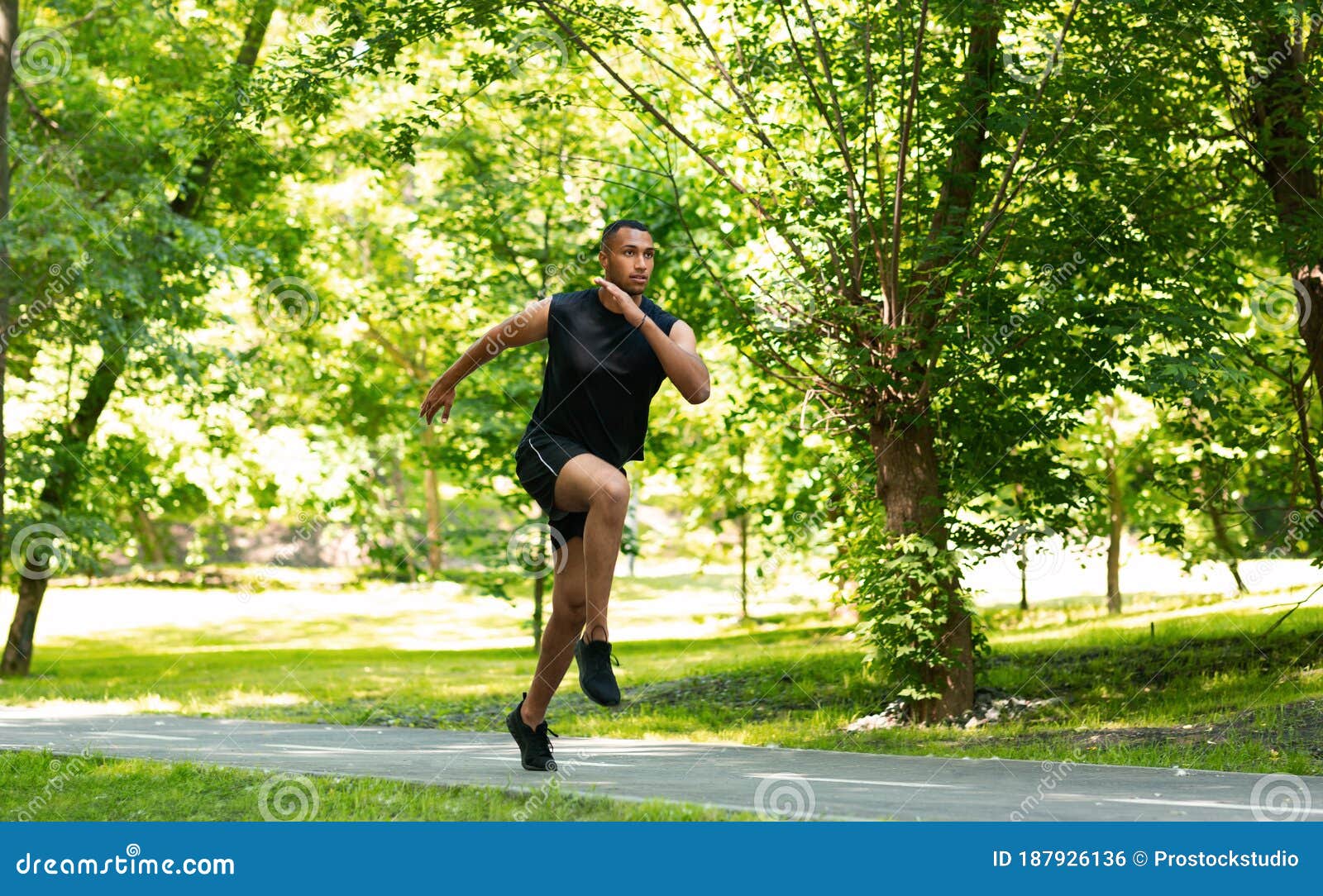 Handsome Millennial Sprinter Running on Track at Beautiful Park, Copy ...