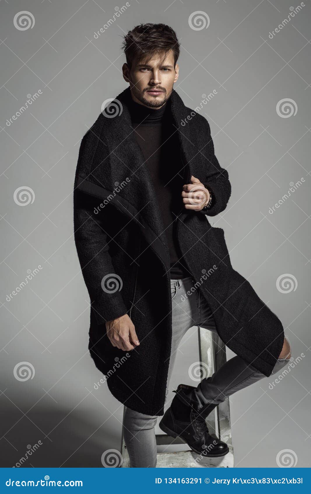 Handsome Model in Black Long Coat Stock Image - Image of hairdo, adult ...