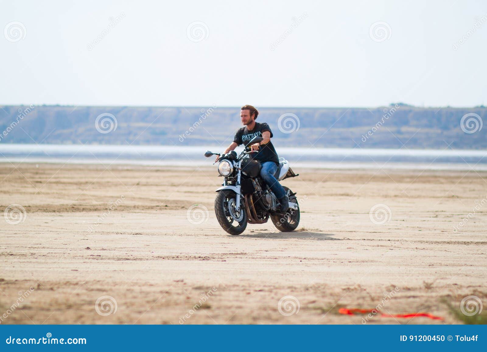 Handsome motorcycle rider stock photo. Image of blond - 91200450